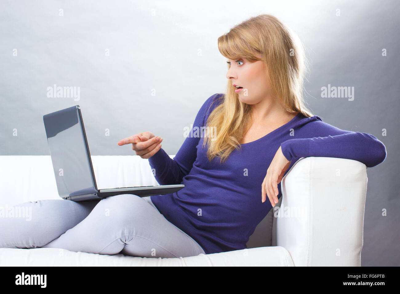 Woman shocked computer screen hi-res stock photography and images - Alamy