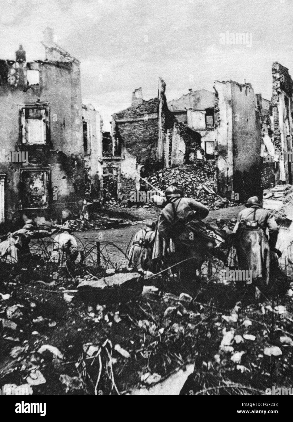 WORLD WAR I: FRENCH TROOPS. /nFrench troops passing through barbed wire ...