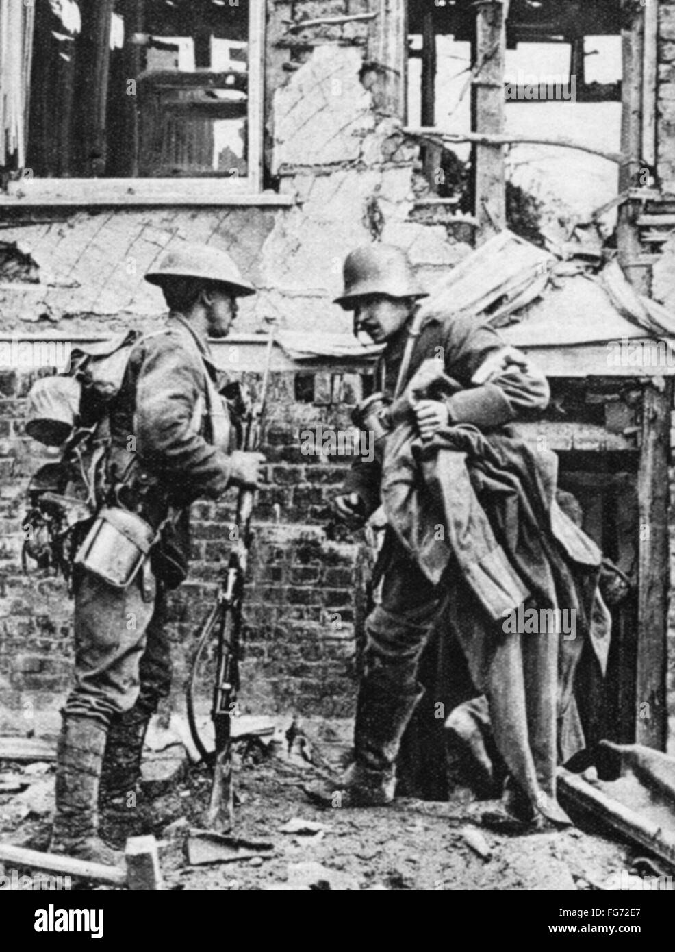 WORLD WAR I: SURRENDER. /nGerman soldier emerging from a cellar to ...