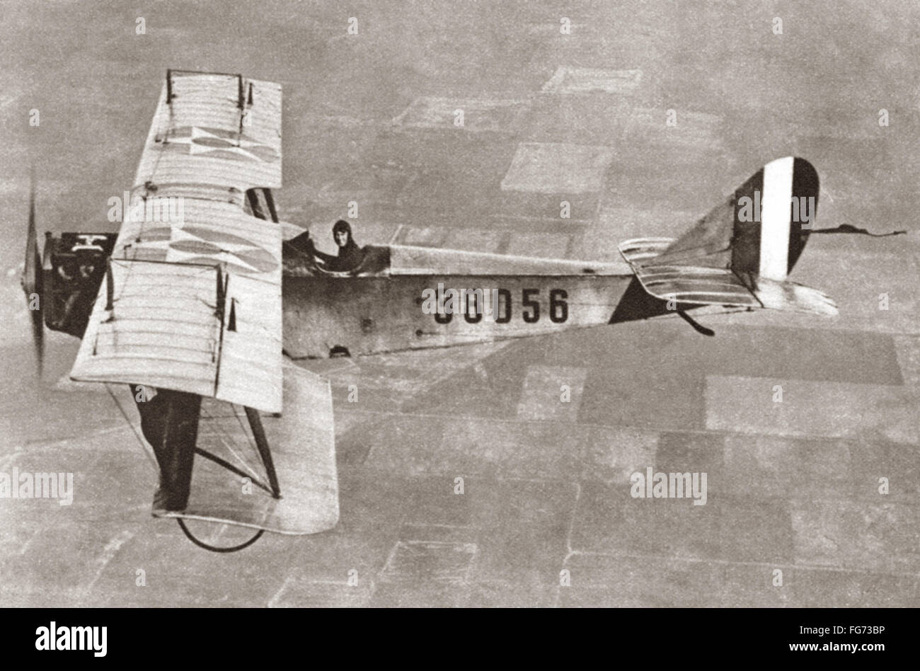 WWI: AMERICAN BOMBER. /nAmerican aviator flying a biplane bomber over ...