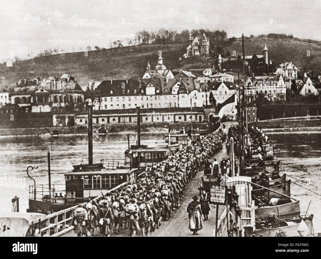 WORLD WAR I: BRIDGE, C1918. /nAmerican troops crossing a bridge on The ...