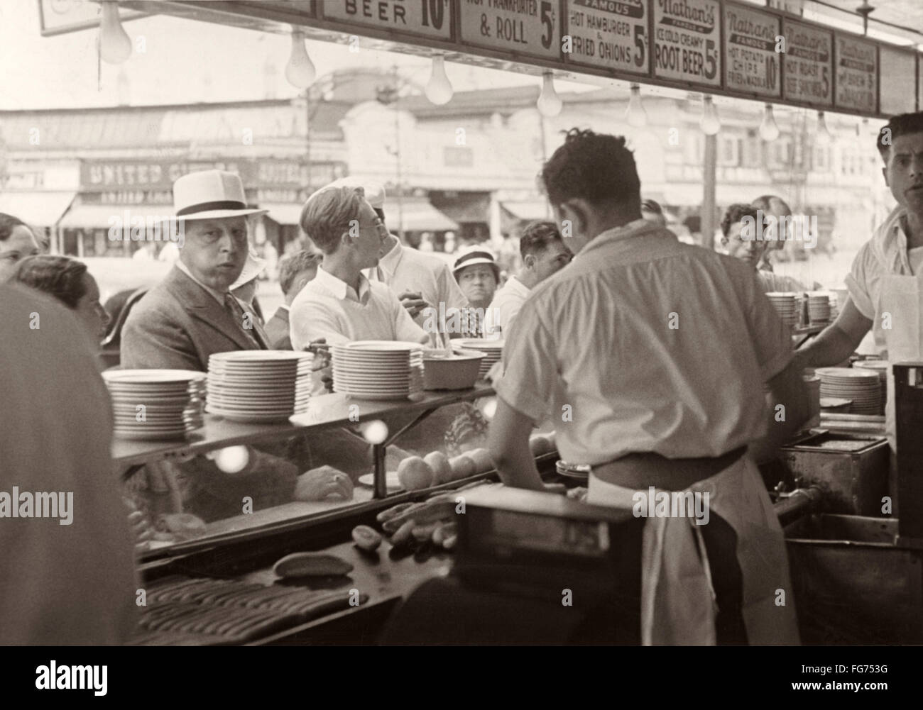 NYC: NATHAN'S, 1935. /nA crowd waiting to be served at Nathan's Famous ...