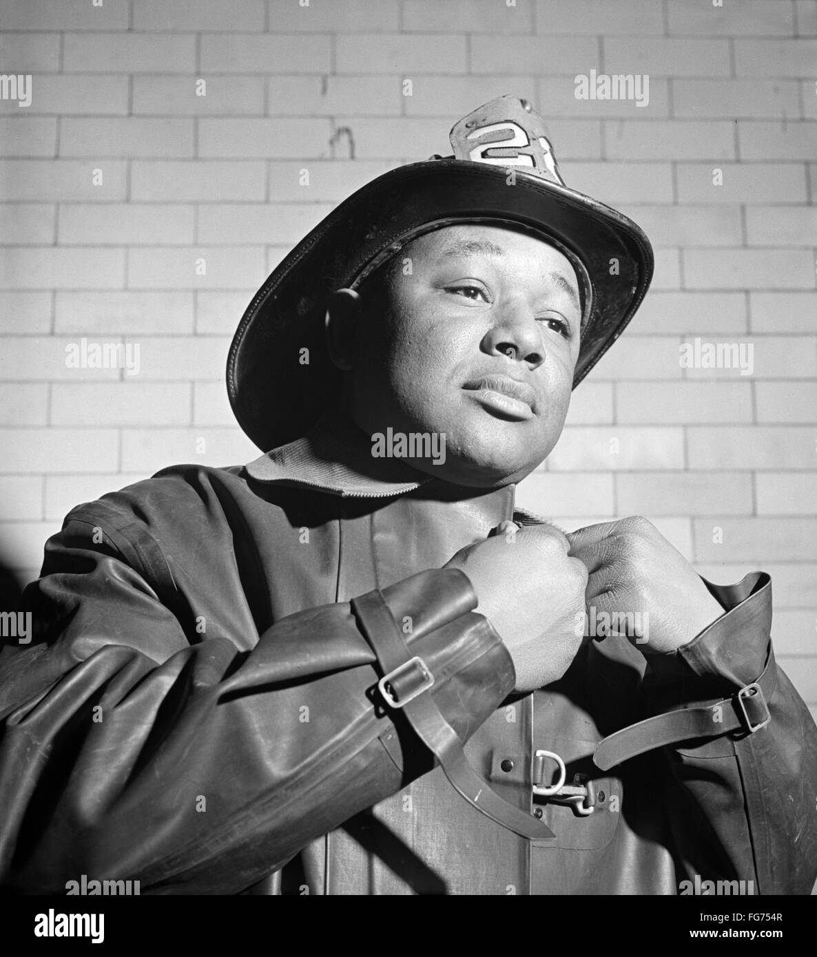 NYC: FIREMAN, 1942. /nPortrait of an unidentified member of the FDNY in ...