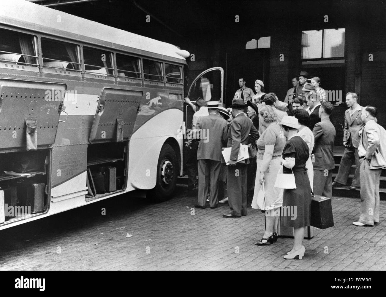 BUS STATION, 1940. /nPeople waiting to board a bus at the Greyhound bus ...