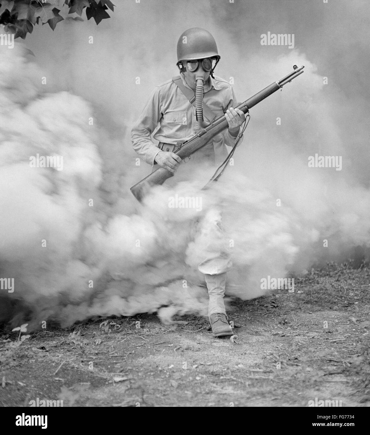 GAS MASK, 1942. /nSergeant George Camblair learning how to use a gas ...