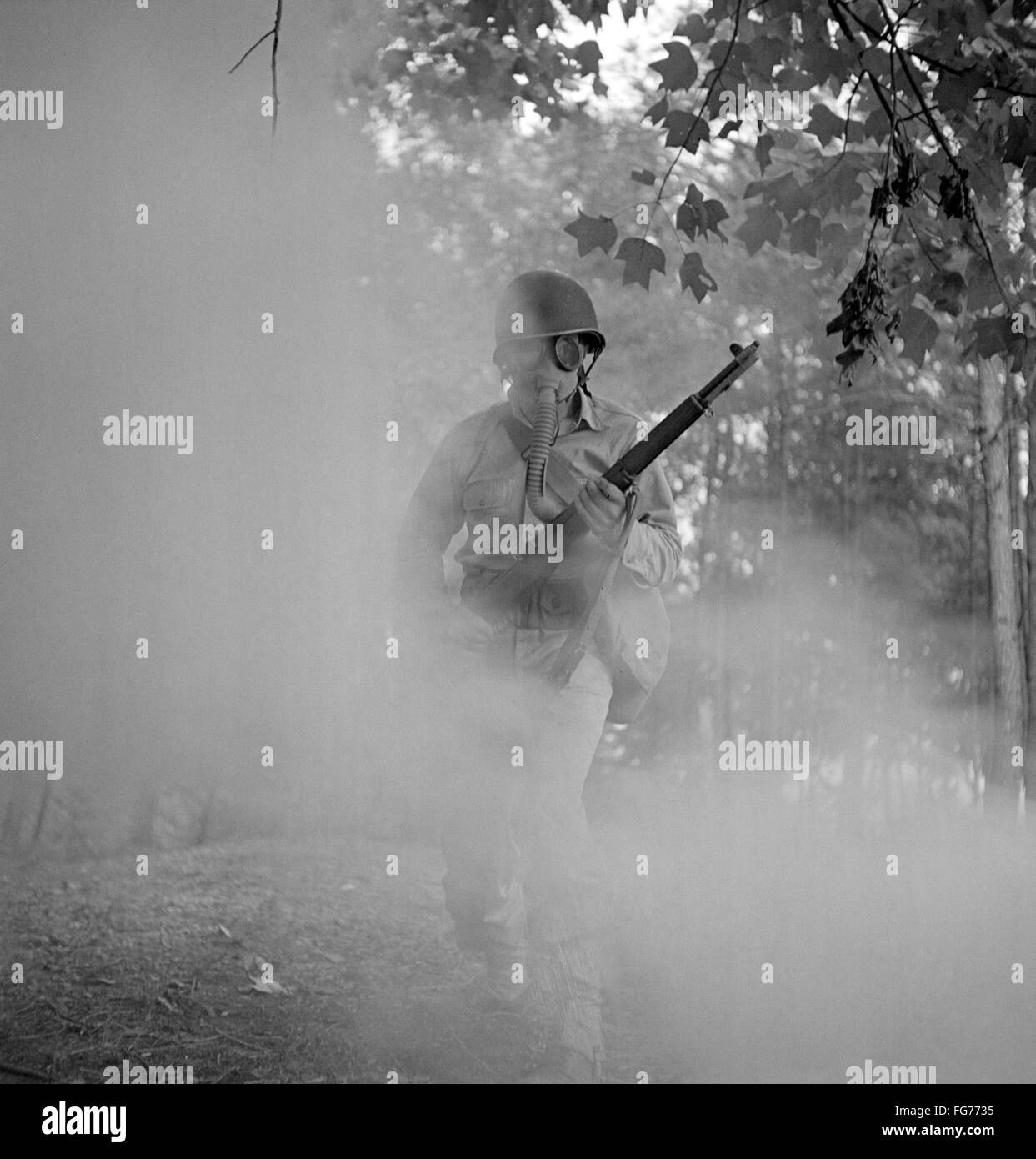 GAS MASK, 1942. /nSergeant George Camblair learning how to use a gas ...