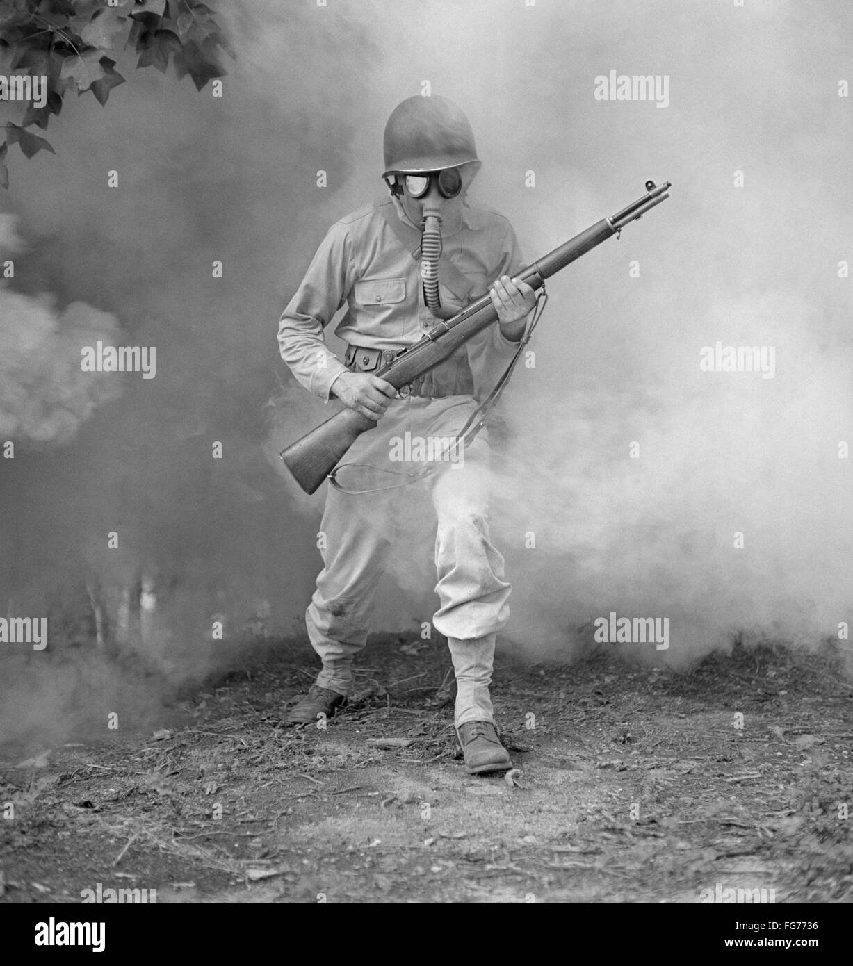 GAS MASK, 1942. /nSergeant George Camblair learning how to use a gas ...
