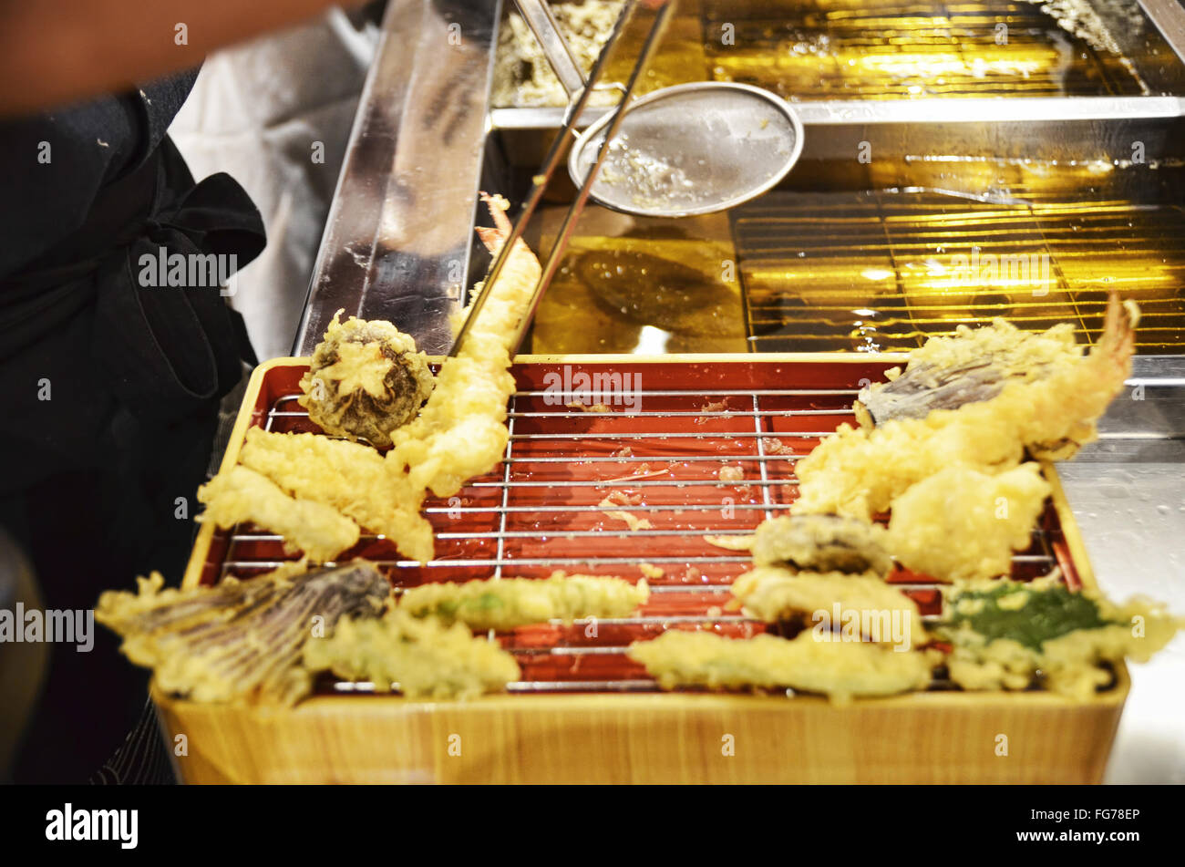 Preparing tempura on the rack Stock Photo - Alamy