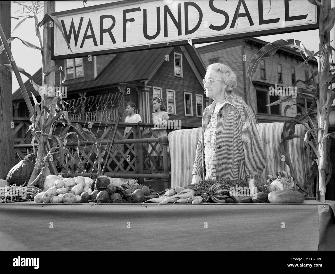 VICTORY STORE, 1942. /nMrs. Alice White selling donated produce for the ...