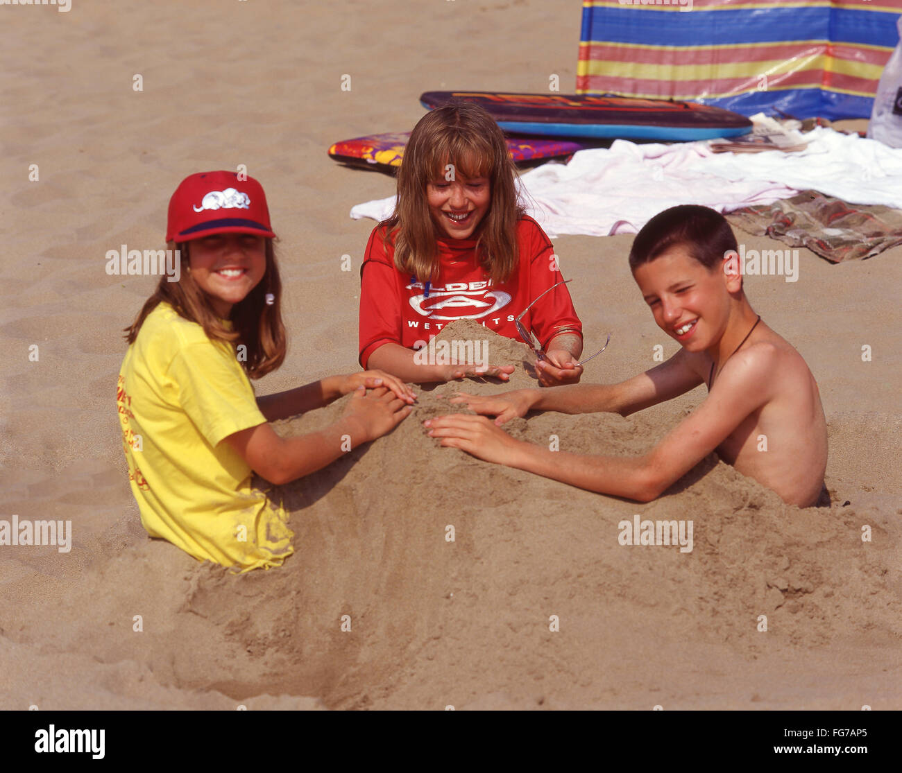 Children playing sand hi-res stock photography and images - Alamy