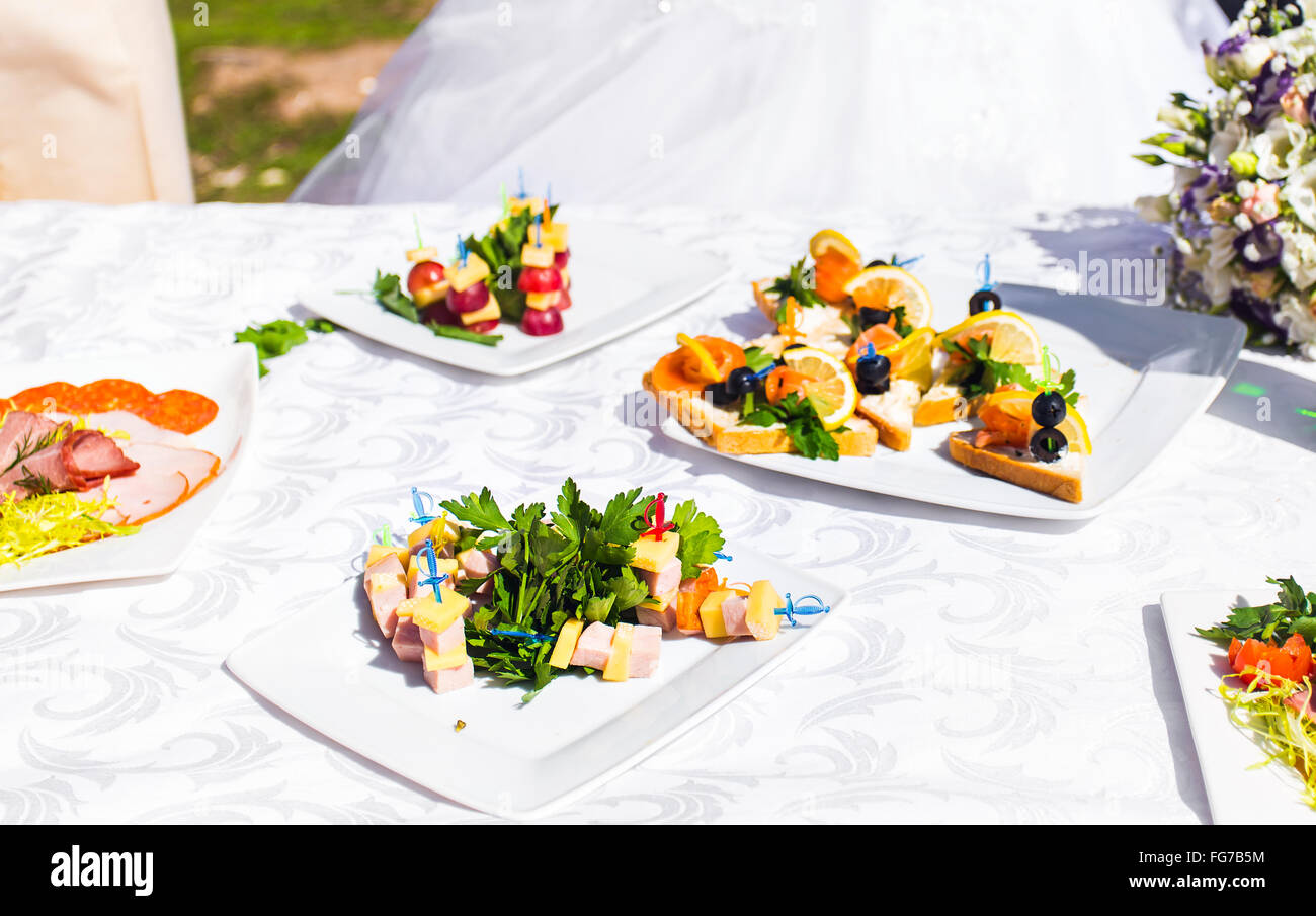 Fingerfood on appetizer table Stock Photo - Alamy