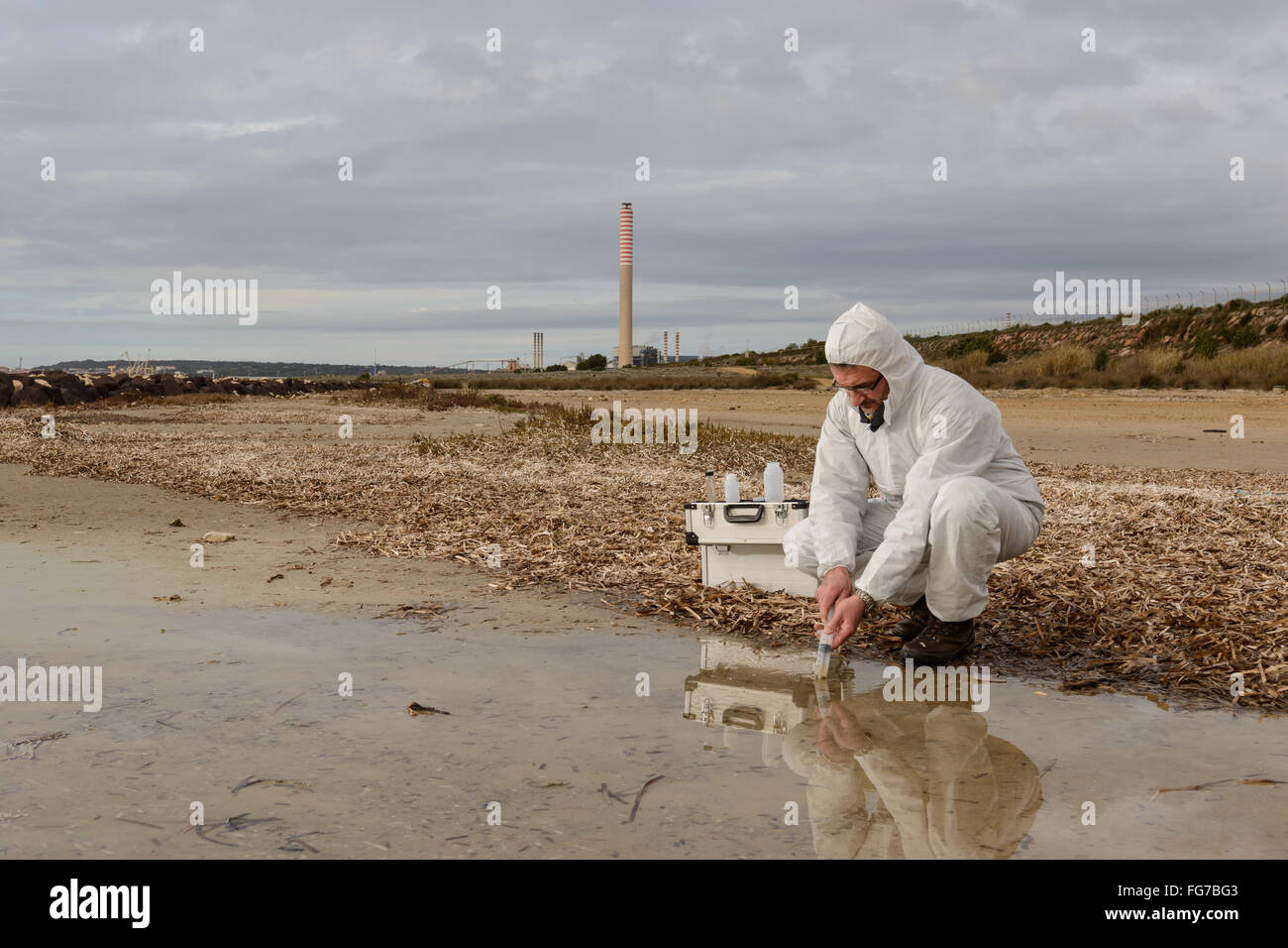 Experts analyze the water in a contaminated environment Stock Photo - Alamy