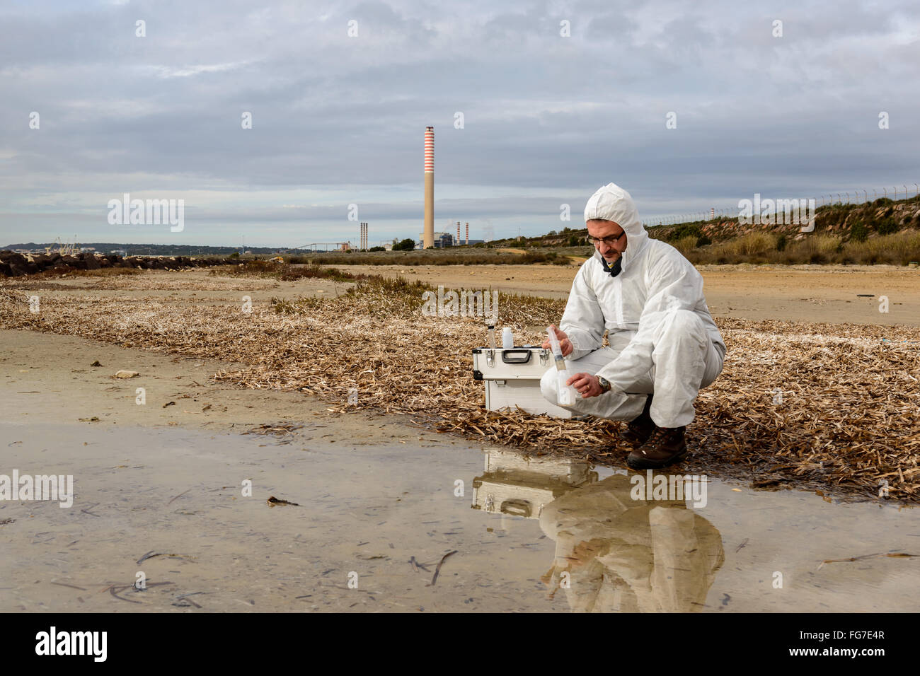 Experts analyze the water in a contaminated environment Stock Photo - Alamy