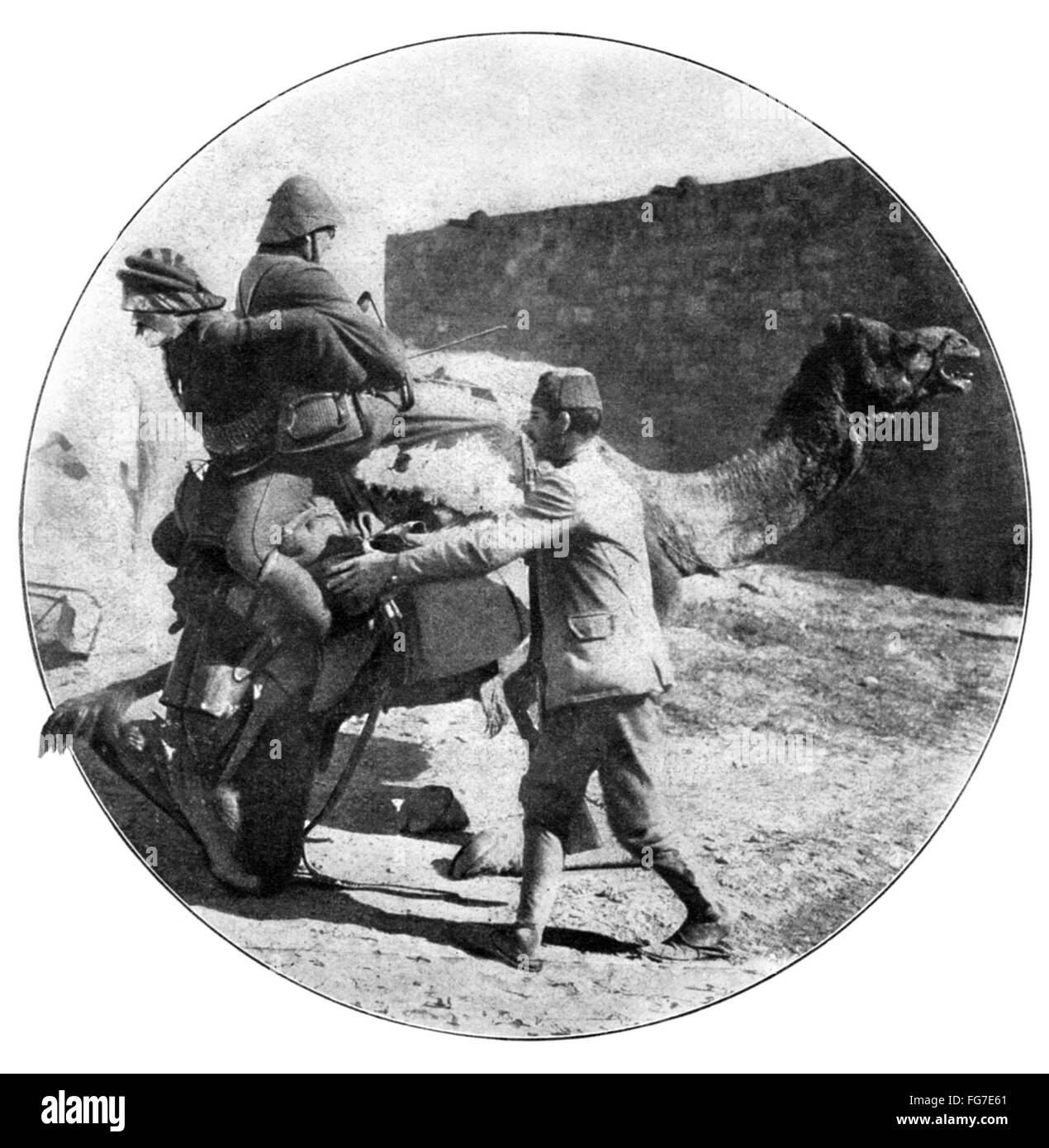 WORLD WAR I: CAMEL, 1915. /nTwo Turkish soldiers mounting a camel ...