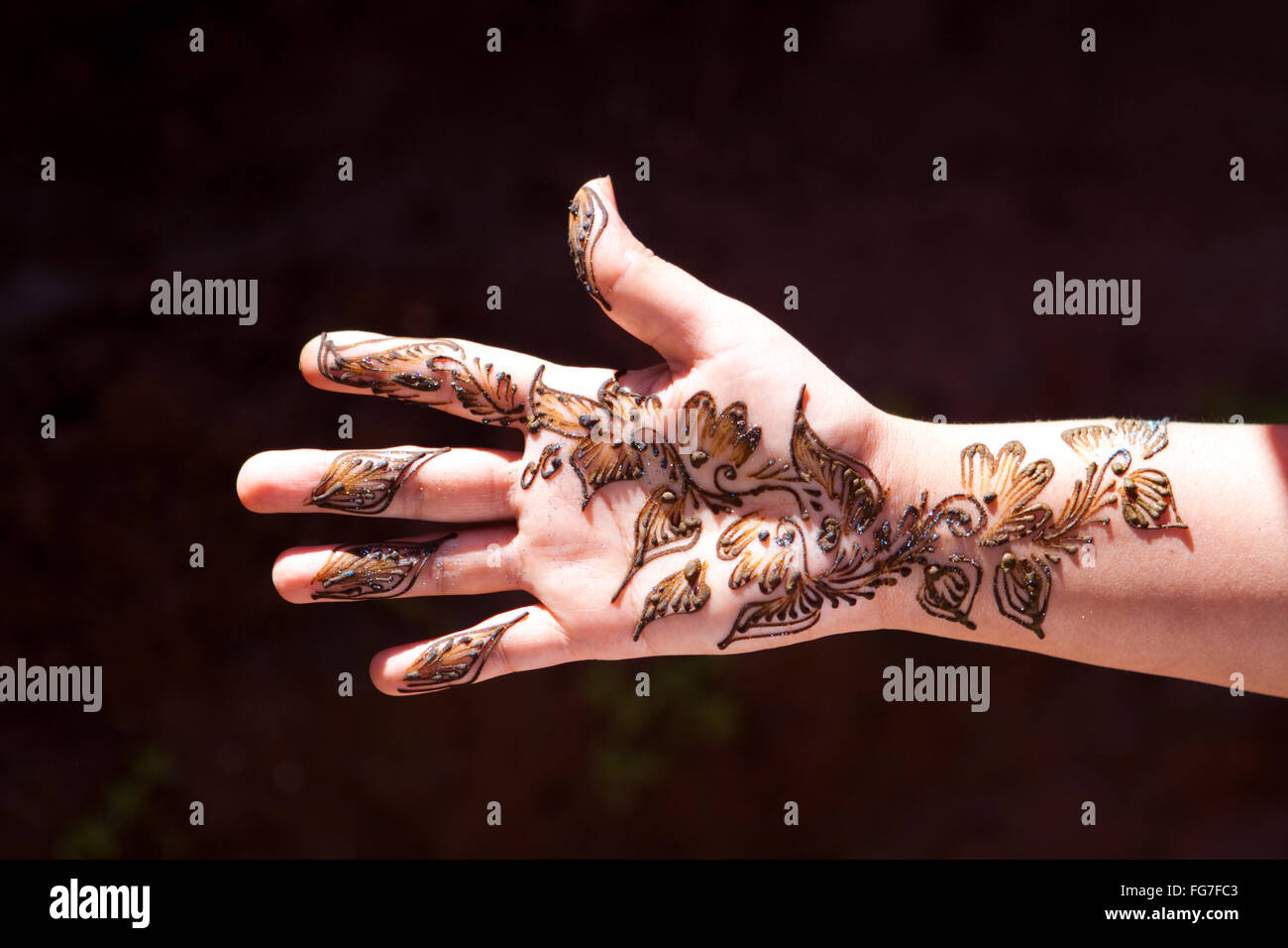Berber girl with Henna body art on her hands Marrakesh, Morocco Stock ...