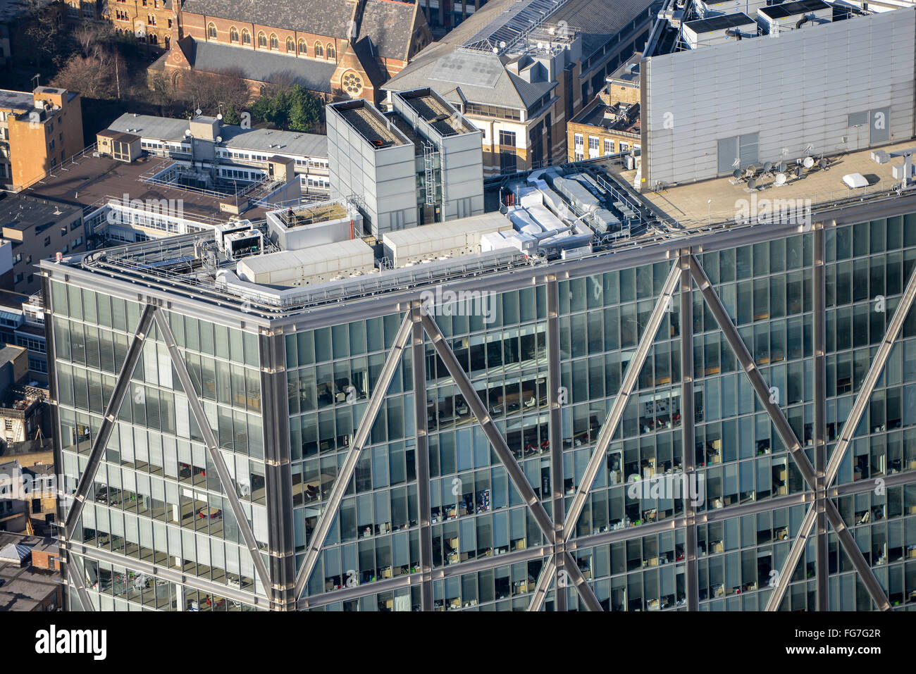 A close up aerial view of the top of Broadgate Tower in the City of ...