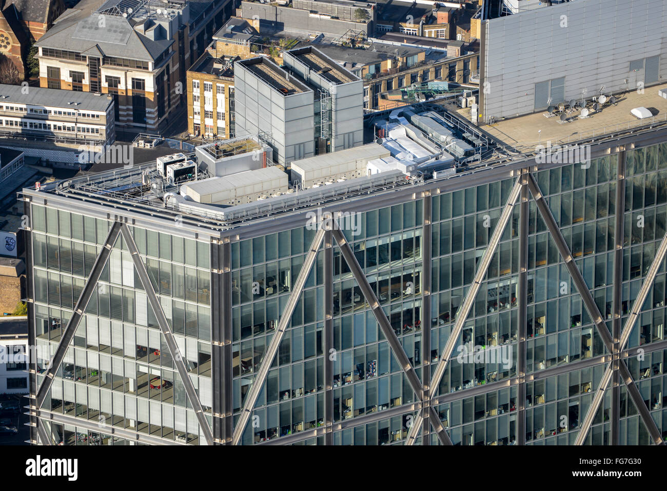 A close up aerial view of the top of Broadgate Tower in the City of ...