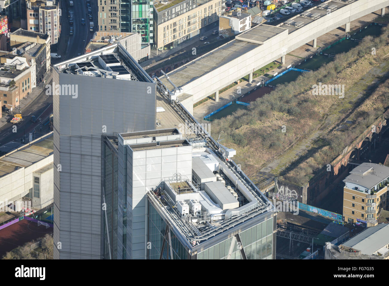 A close up aerial view of the top of Broadgate Tower in the City of ...