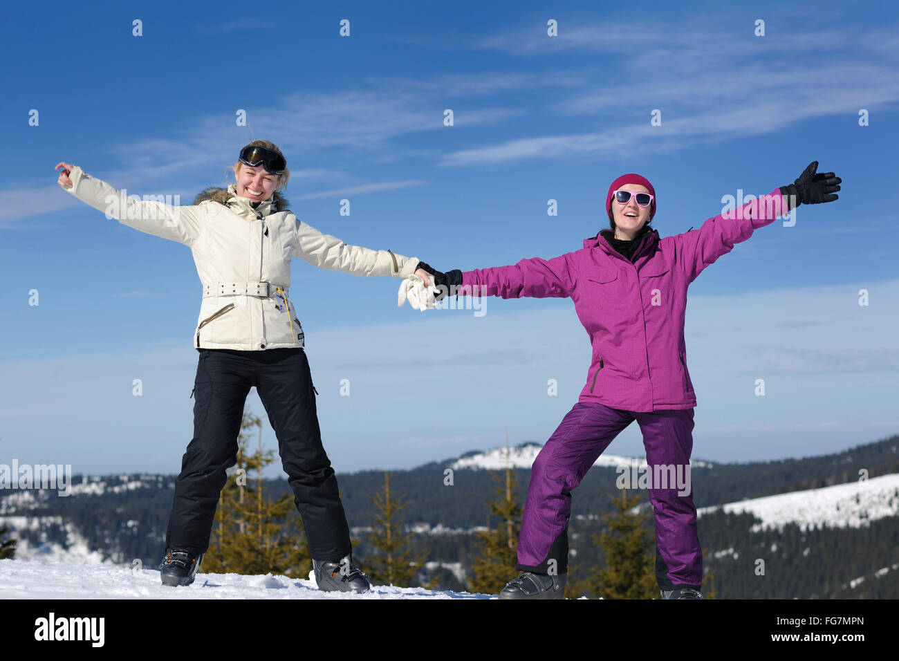 winter season fun with group of girls Stock Photo - Alamy