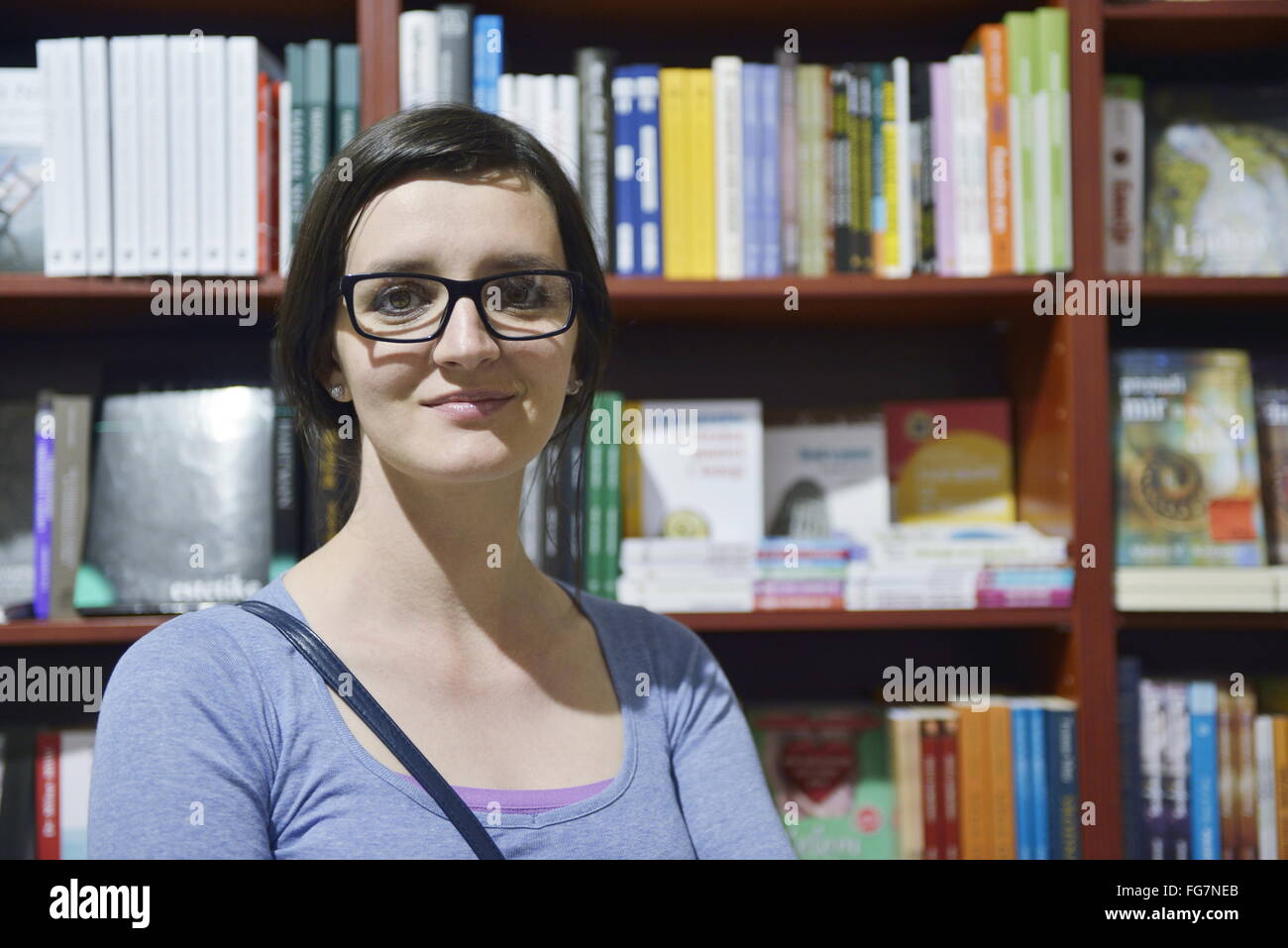 female in library Stock Photo - Alamy