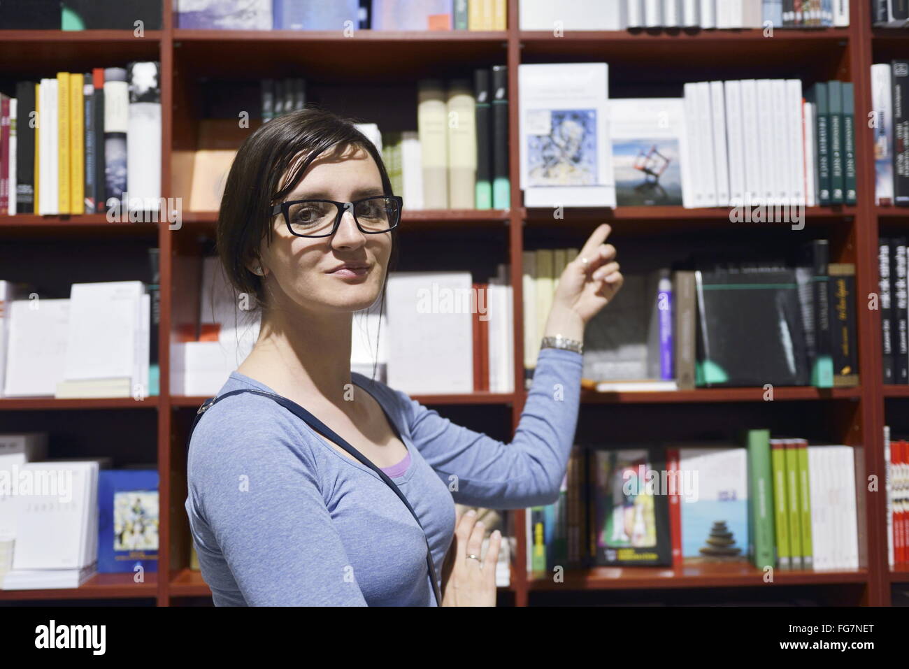female in library Stock Photo - Alamy