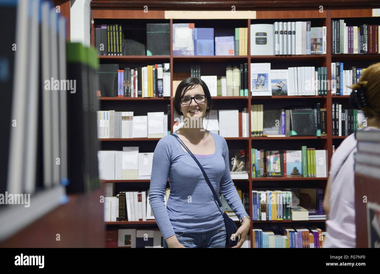 female in library Stock Photo - Alamy
