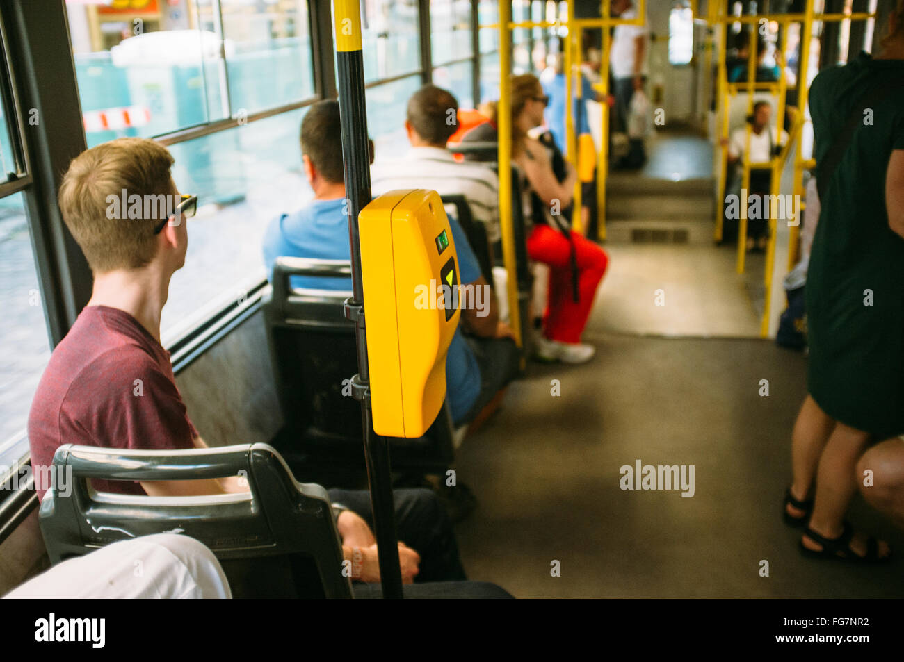 Young man sitting on bus hi-res stock photography and images - Alamy