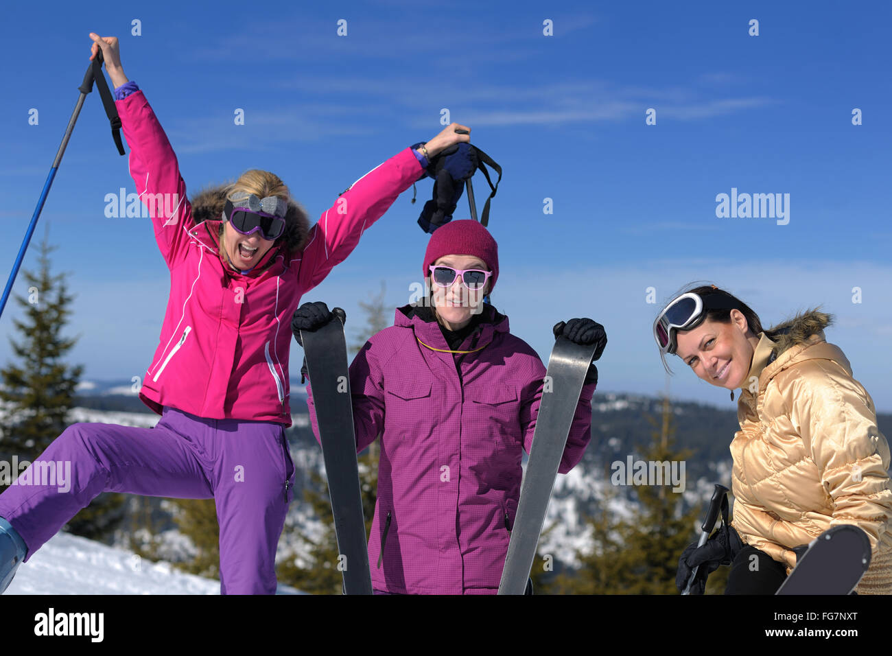 winter season fun with group of girls Stock Photo - Alamy