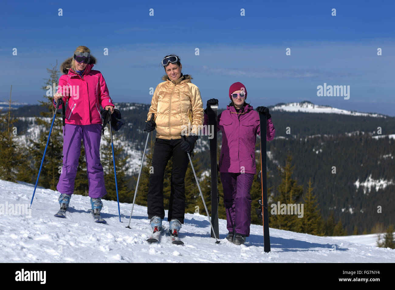 winter season fun with group of girls Stock Photo - Alamy
