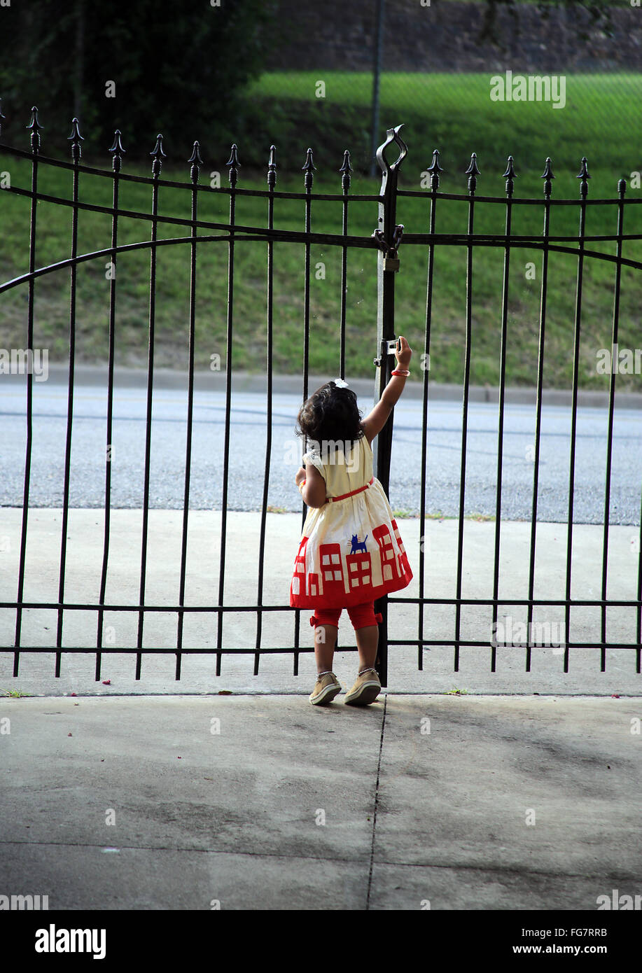 Girl closed gate hi-res stock photography and images - Alamy