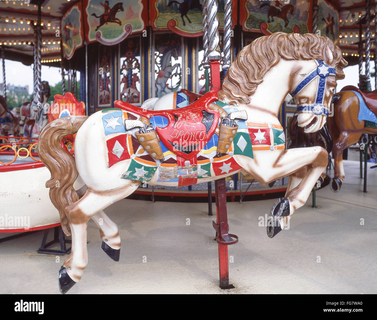 Children fairground carousel horses hi-res stock photography and images ...