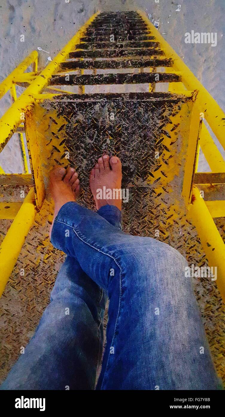 Person ladder barefoot hi-res stock photography and images - Alamy