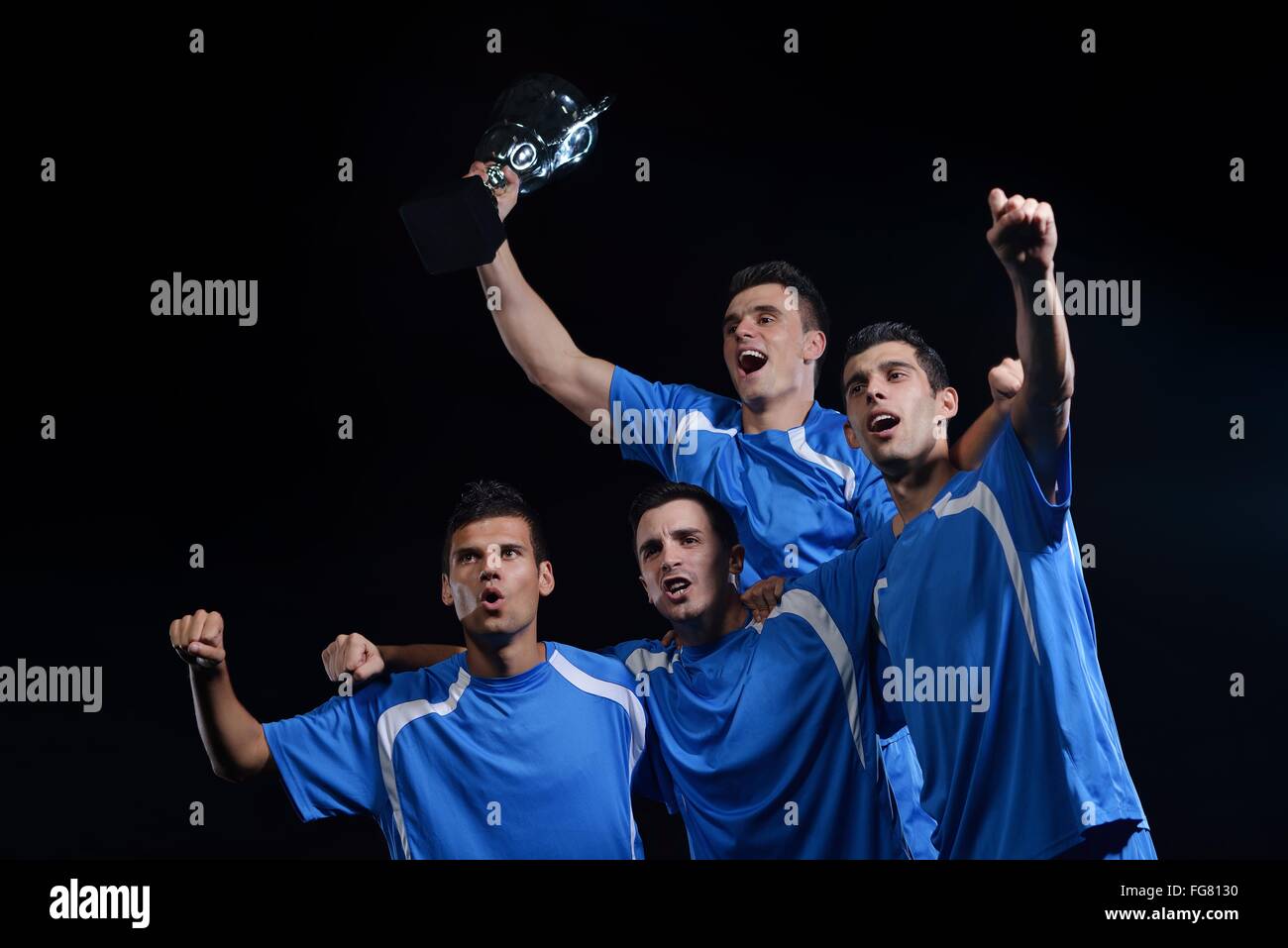 soccer players celebrating victory Stock Photo - Alamy