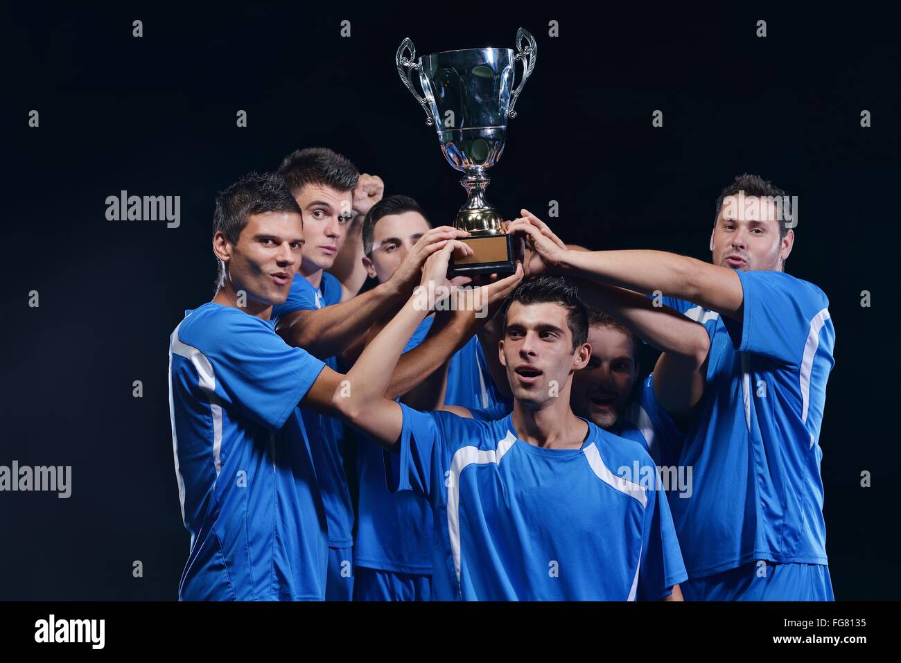 soccer players celebrating victory Stock Photo - Alamy