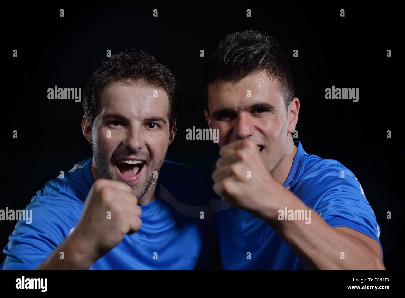 soccer players celebrating victory Stock Photo - Alamy