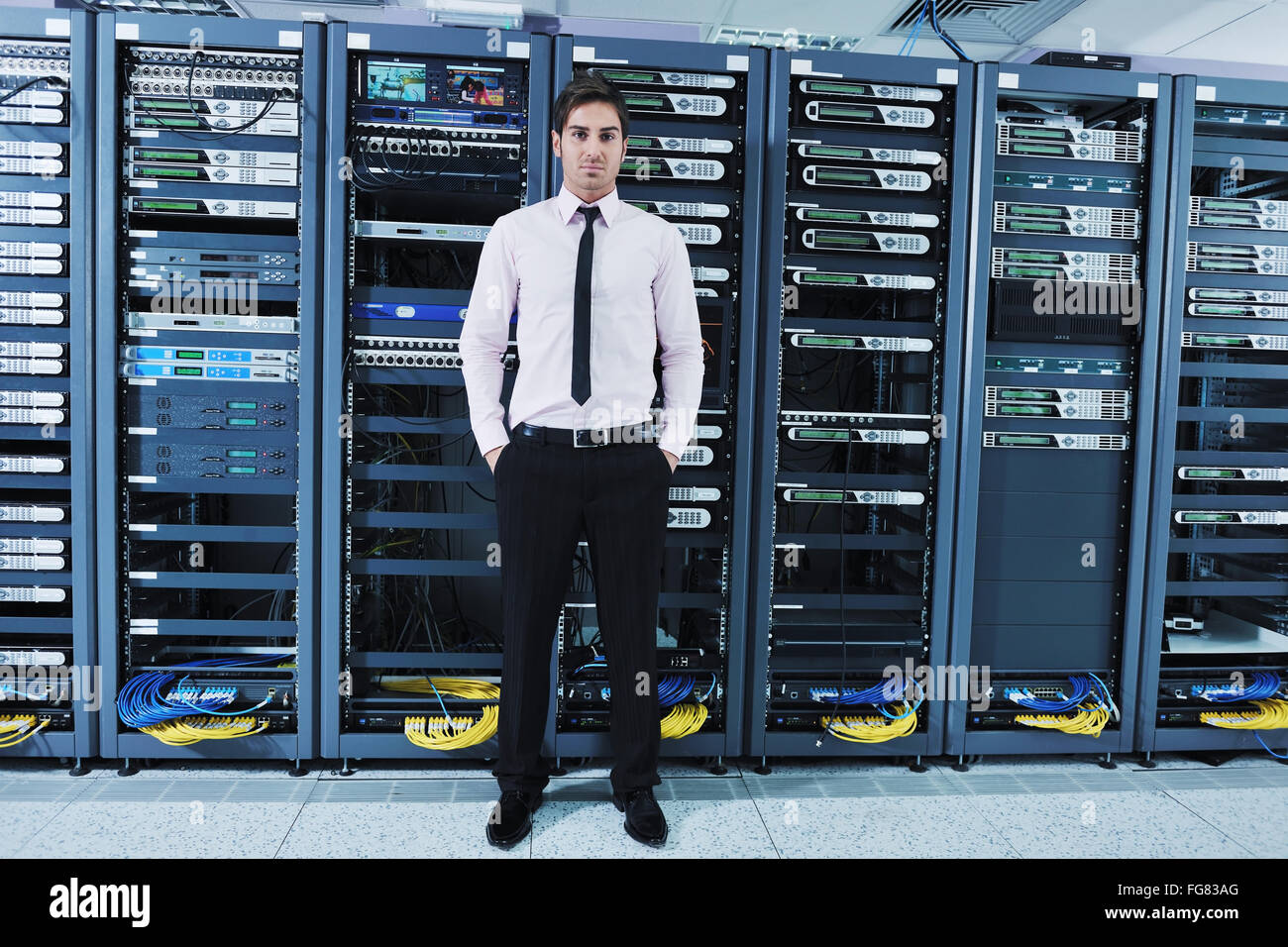young it engineer in datacenter server room Stock Photo - Alamy