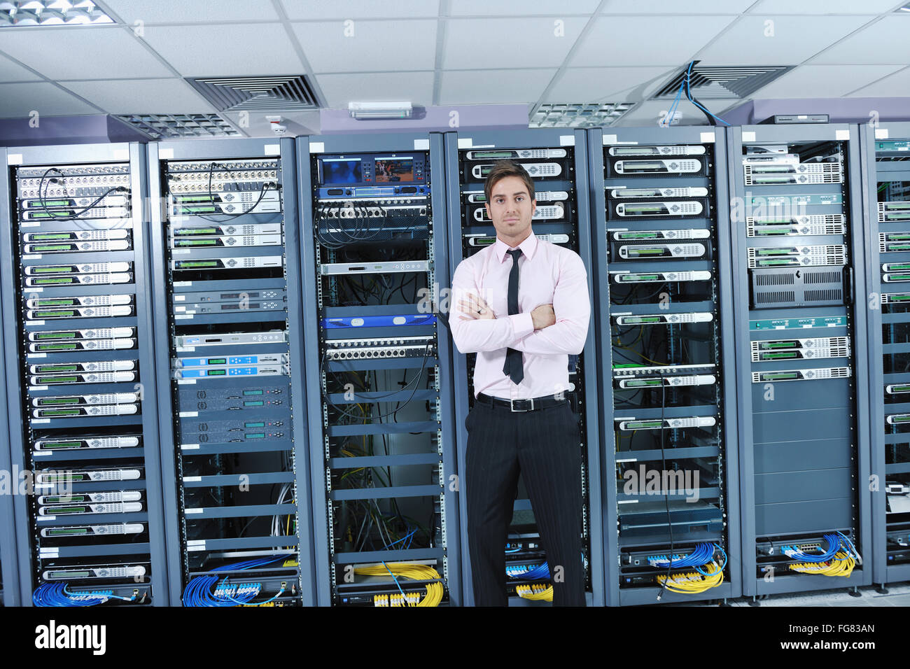 young it engineer in datacenter server room Stock Photo - Alamy