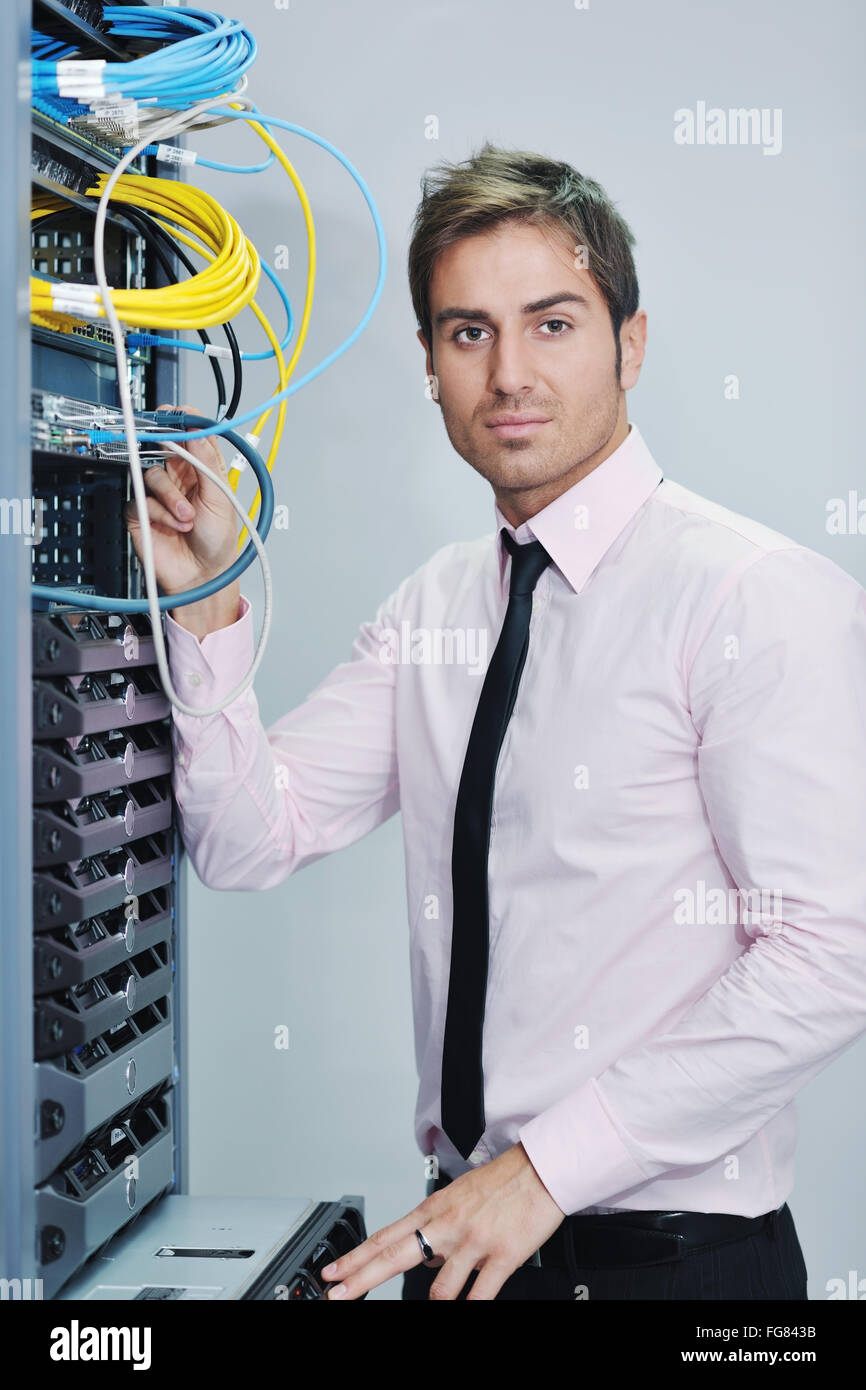 young it engineer in datacenter server room Stock Photo - Alamy