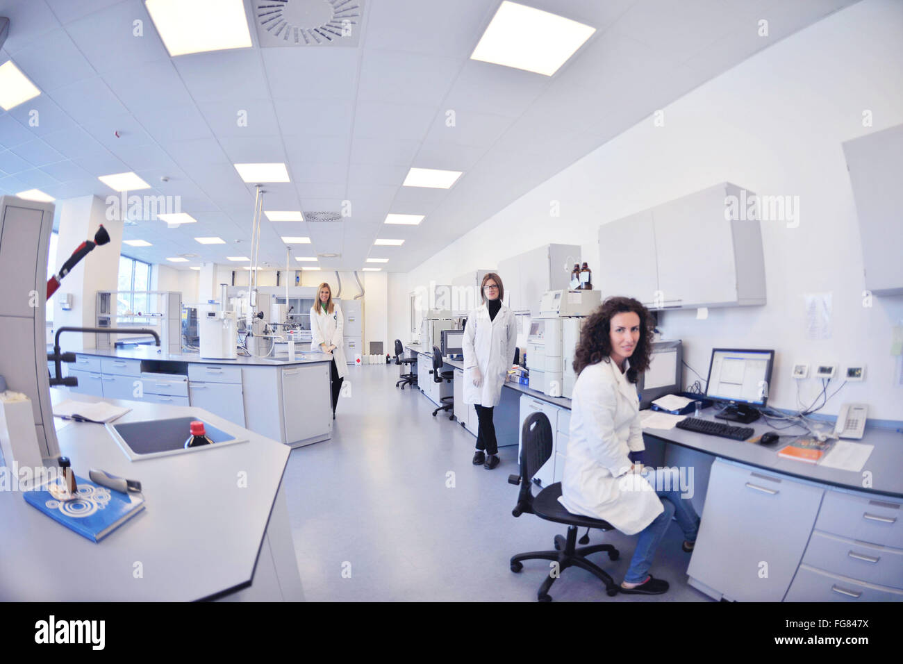 scientists working at the laboratory Stock Photo - Alamy