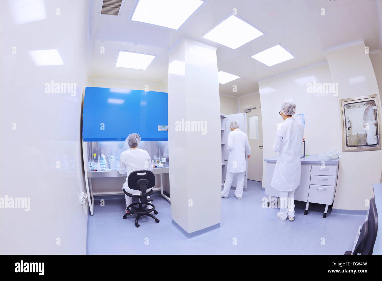 scientists working at the laboratory Stock Photo - Alamy