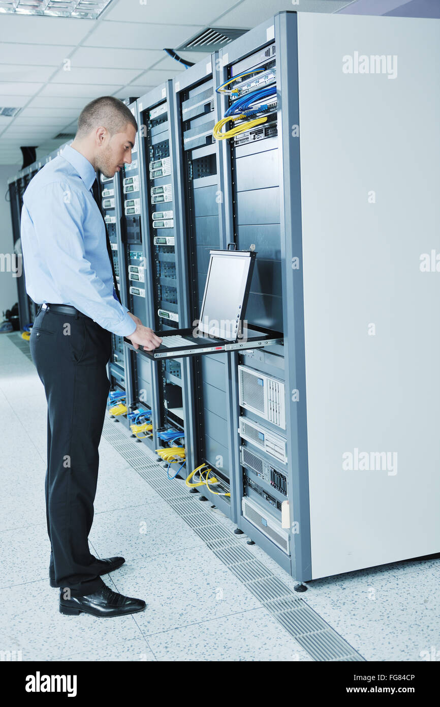 young it engineer in datacenter server room Stock Photo - Alamy