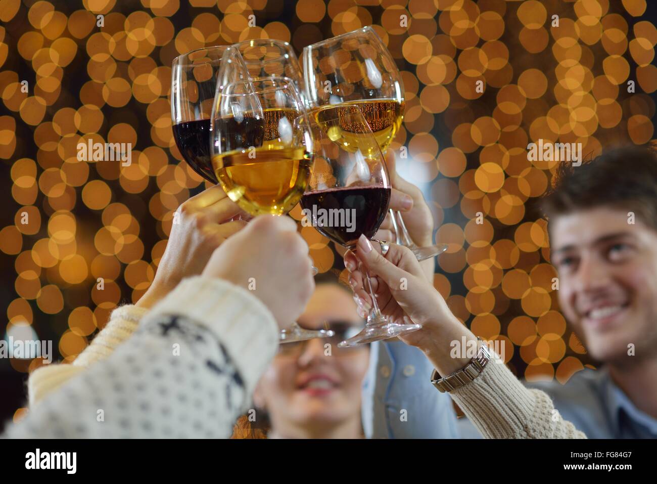 Hands holding the glasses of champagne and wine Stock Photo - Alamy