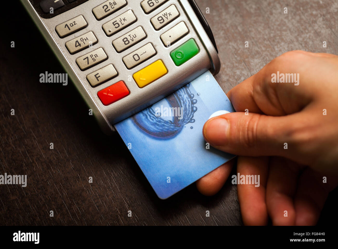 Color image of a POS and credit cards Stock Photo - Alamy