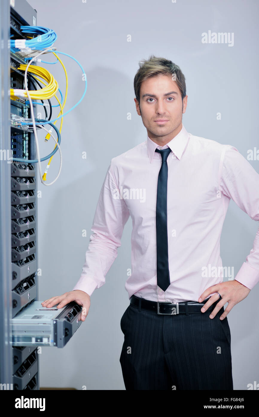 young it engineer in datacenter server room Stock Photo - Alamy