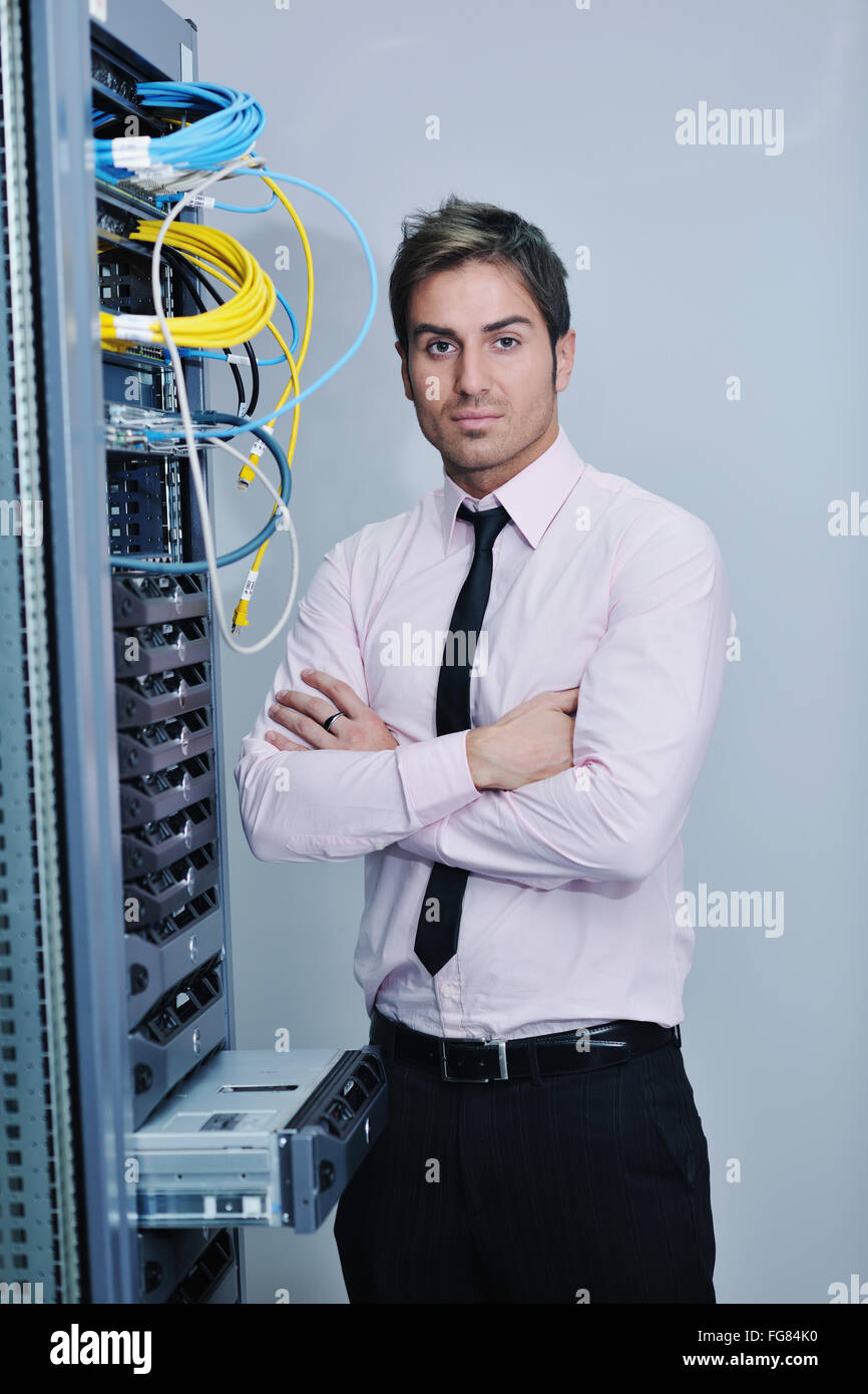 young it engineer in datacenter server room Stock Photo - Alamy