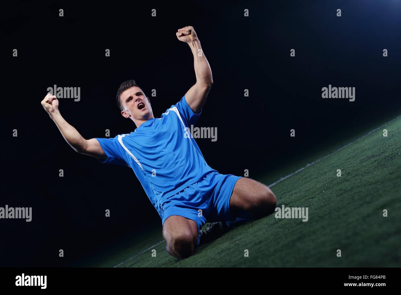soccer players celebrating victory Stock Photo - Alamy