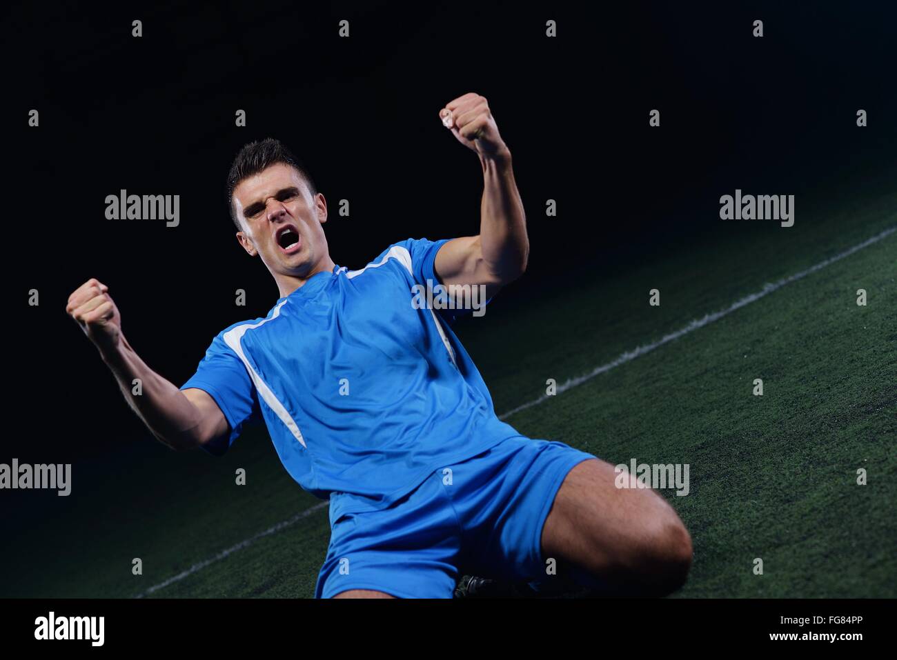 soccer players celebrating victory Stock Photo - Alamy