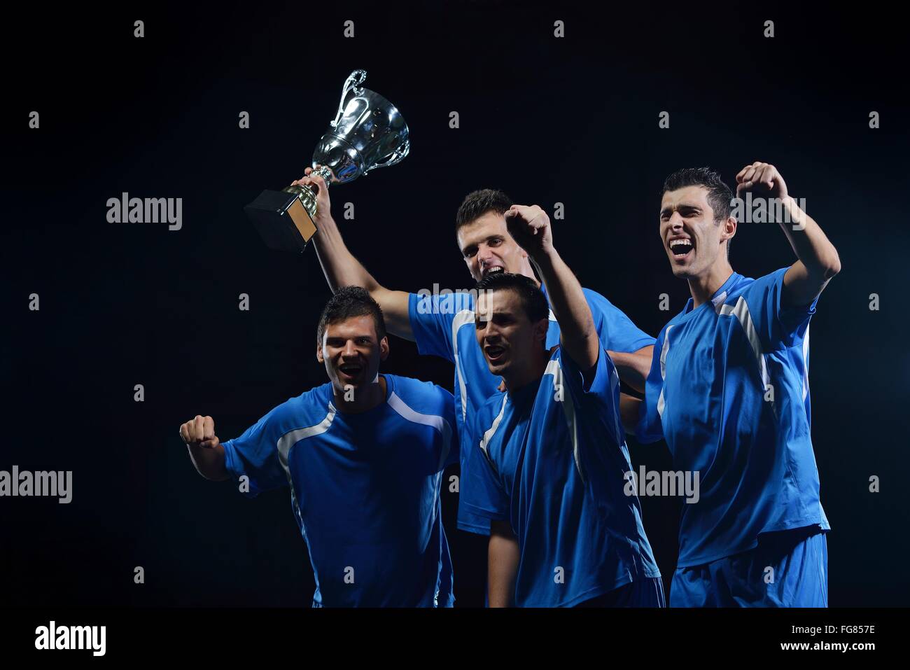 soccer players celebrating victory Stock Photo - Alamy