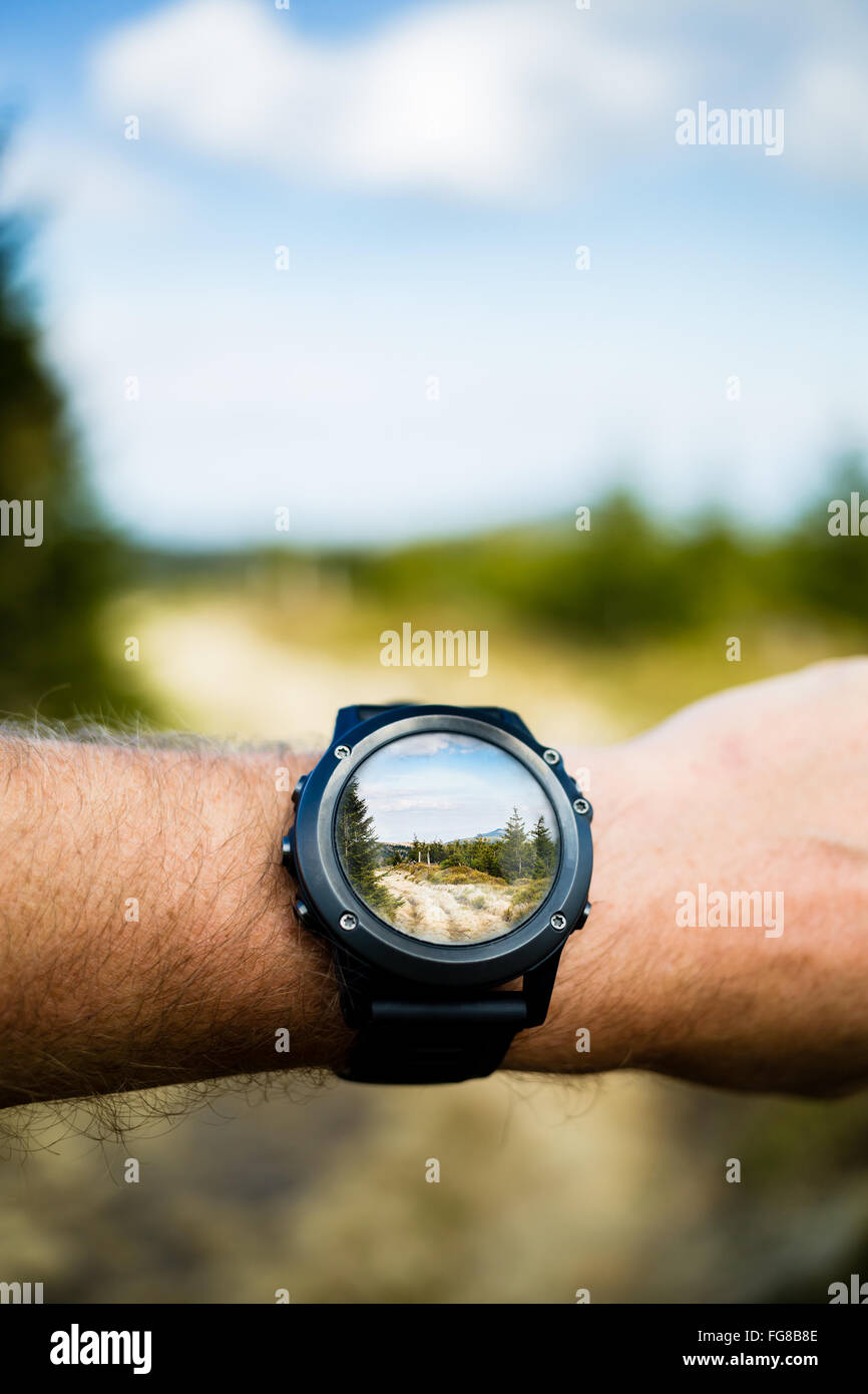 Wearable technology, man taking photo with smartwatch camera in ...