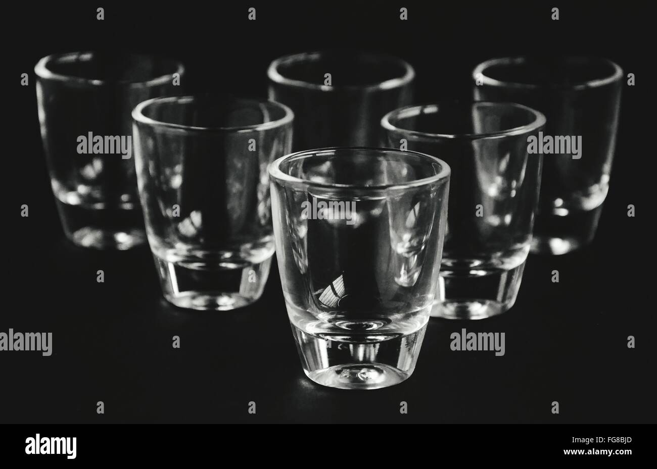 High Angle View Of Drinking Glasses Against Black Background Stock ...
